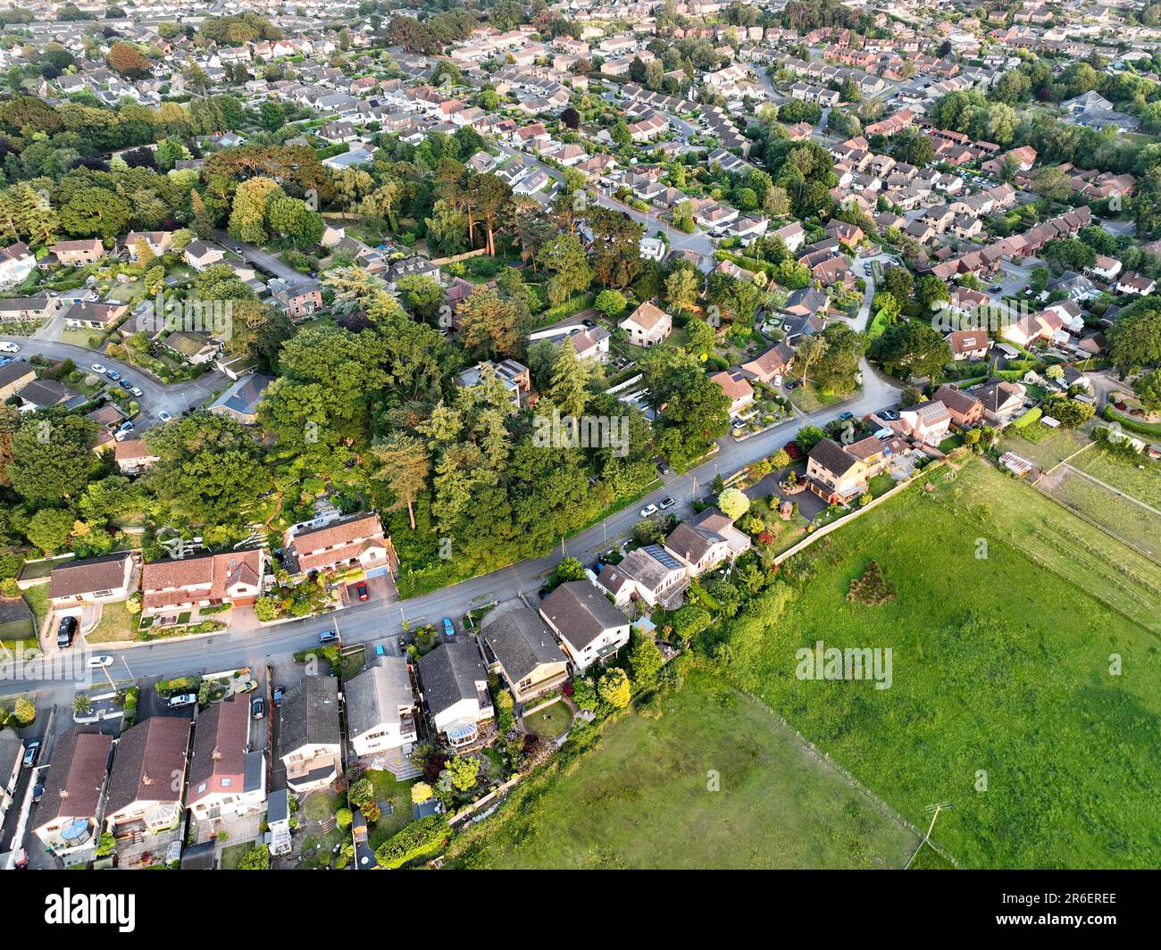 Aerial view of a town on the edge of fields and countryside in southern ...
