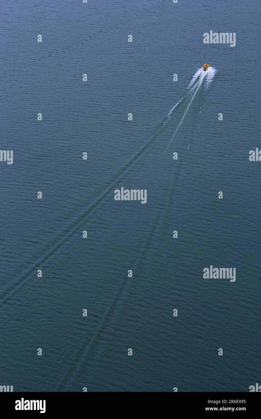 A top-down view of the speed of a motorboat sailing on water Stock ...