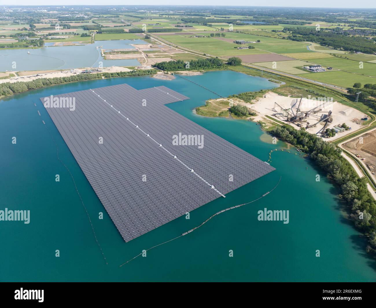 Solar panel farm on water surface Stock Photo - Alamy