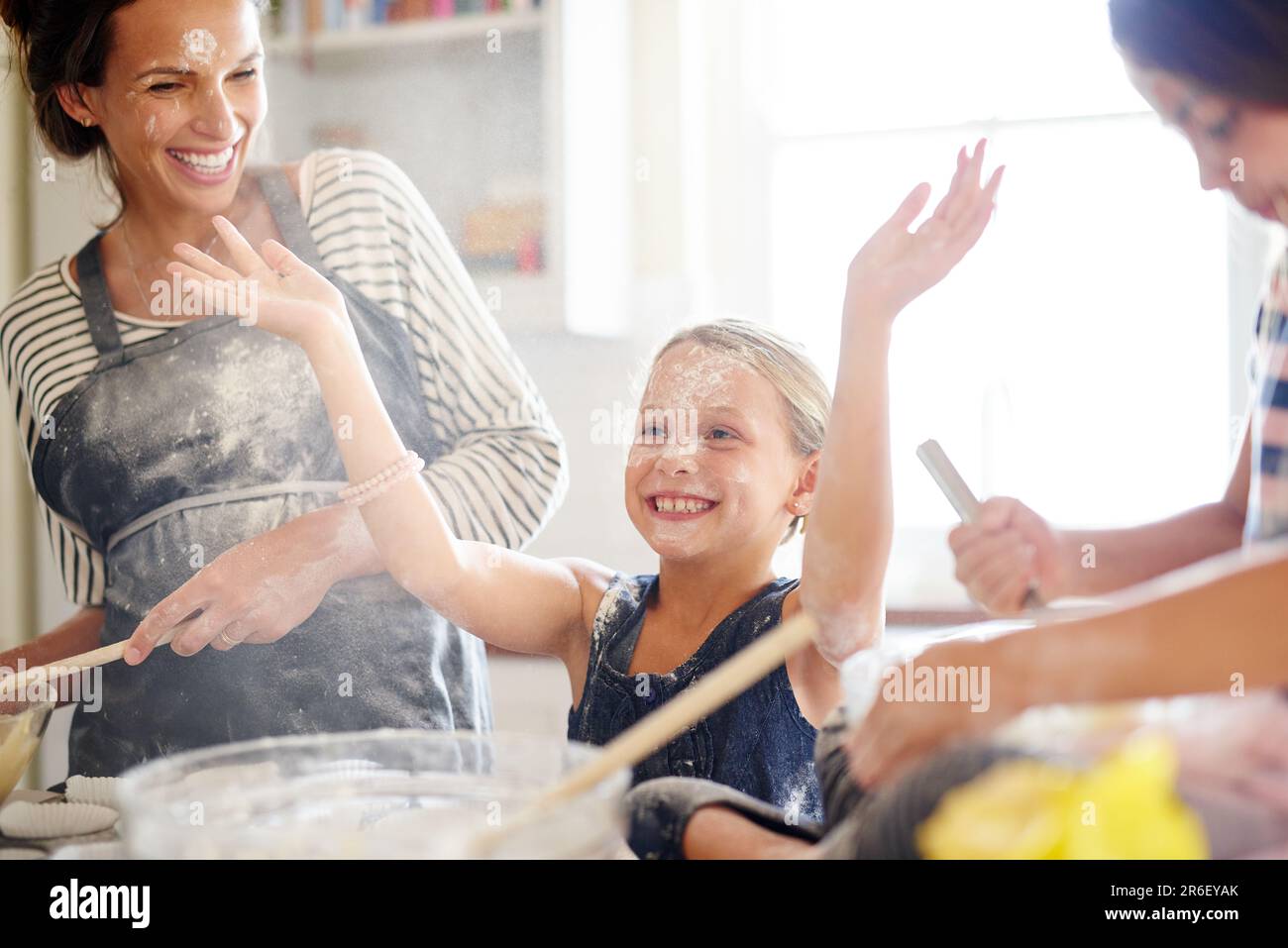 Family, girls and mother baking, kitchen and excited with love, child ...