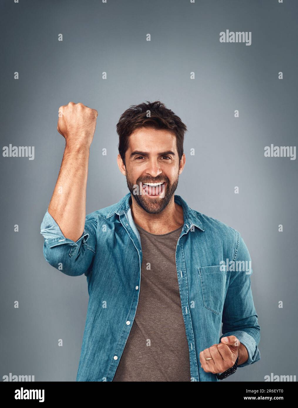 Happy man, fist and celebration for winning, success or victory against ...