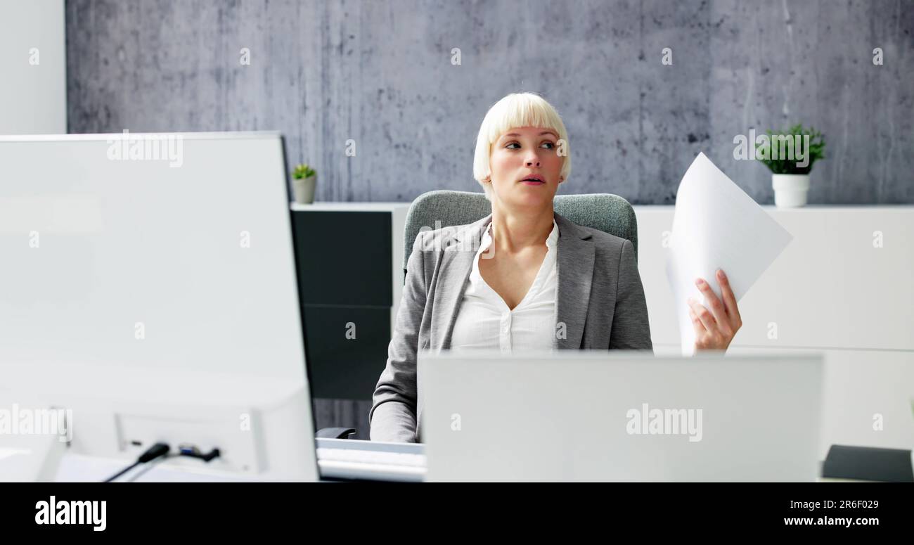 Hot Office Weather. Woman Sweating At Work Stock Photo - Alamy