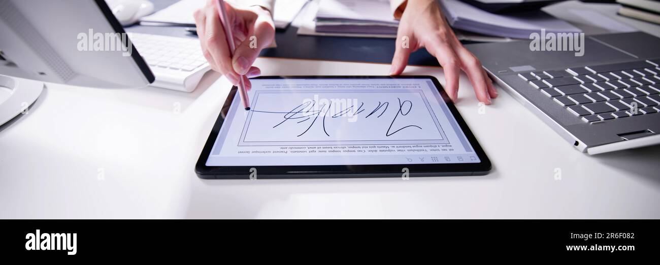 Contract E Signature. Employee Signing Law Document Stock Photo - Alamy