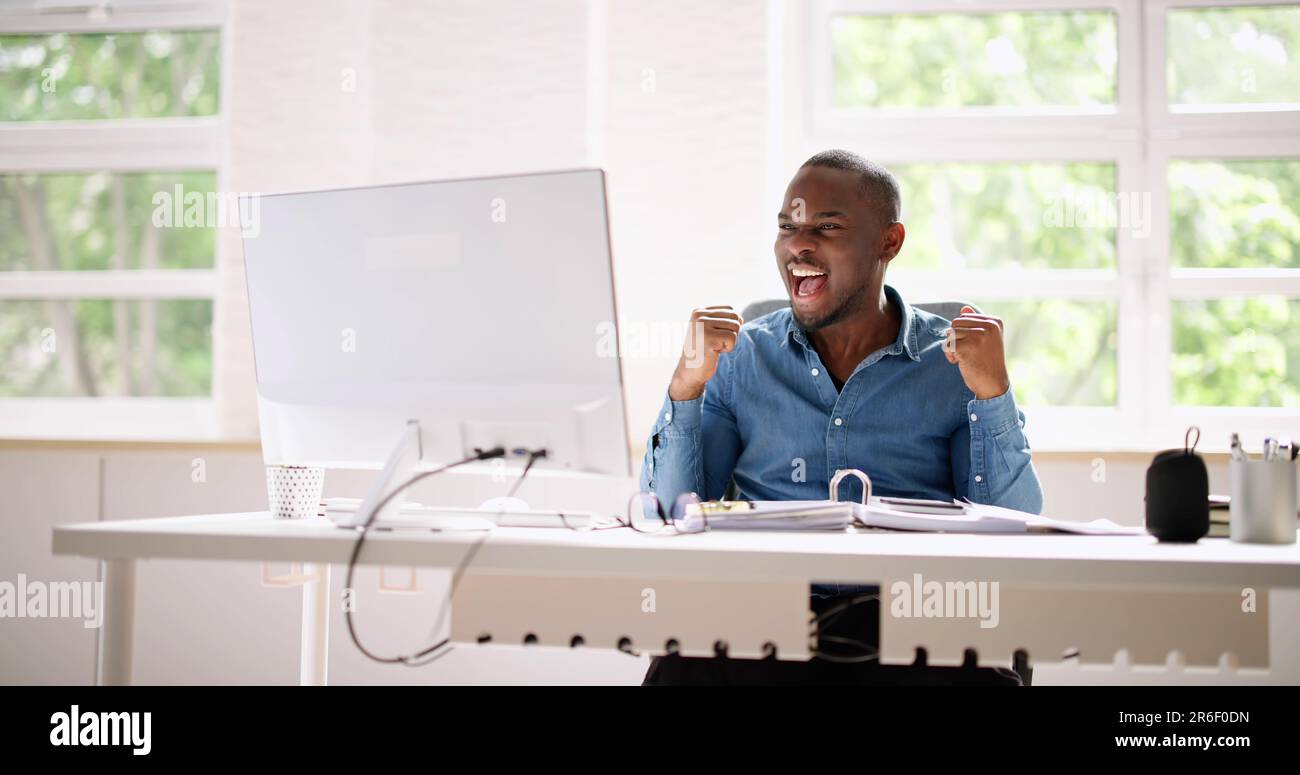 Happy African American Stock Trader Business Man With Computer Stock ...