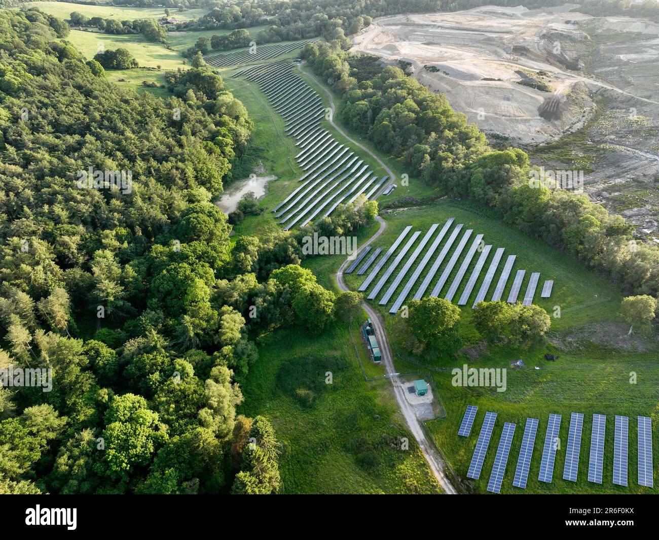 A large-scale solar farm set in a countryside environment Stock Photo ...