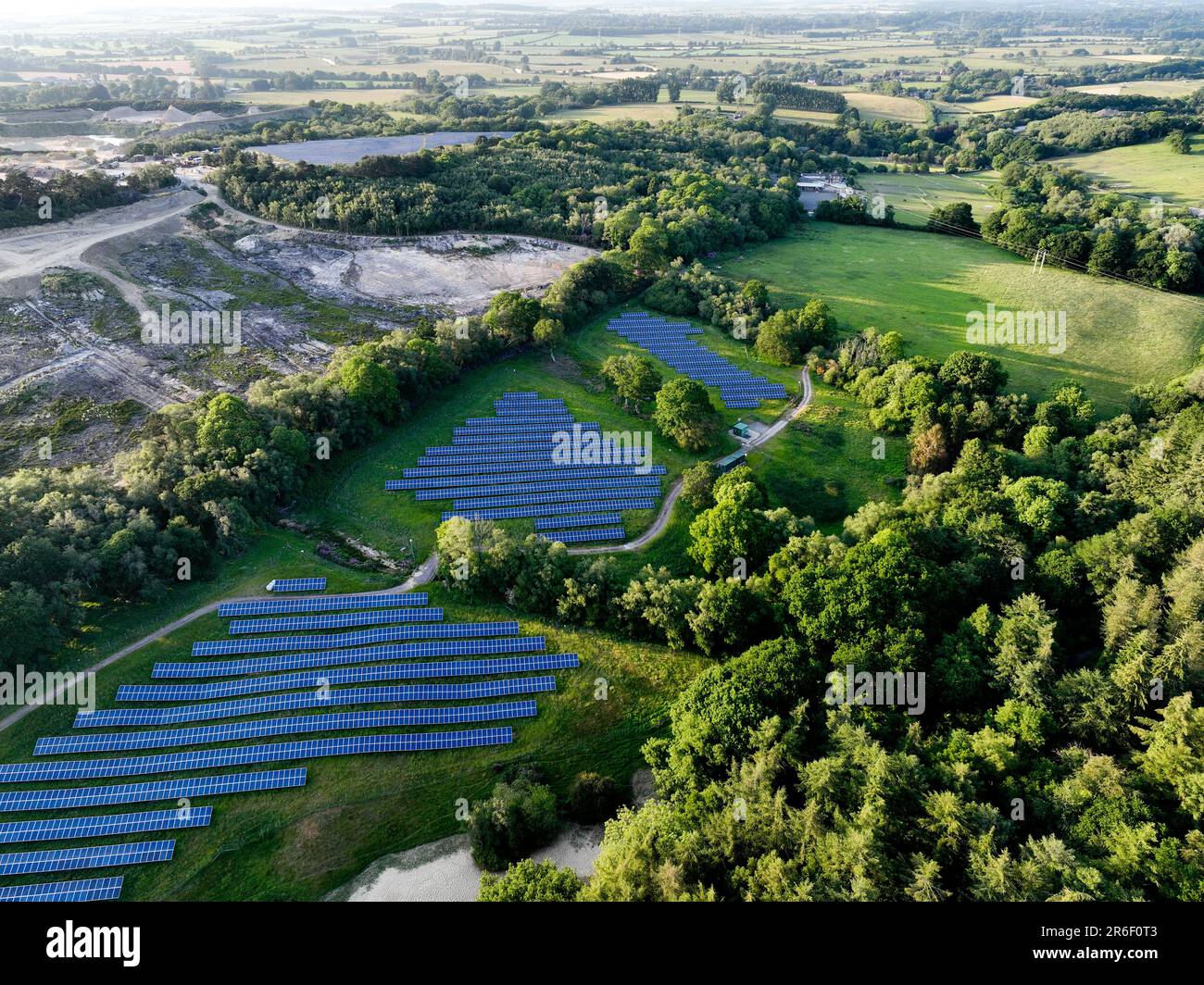 A large-scale solar farm set in a countryside environment Stock Photo - Alamy