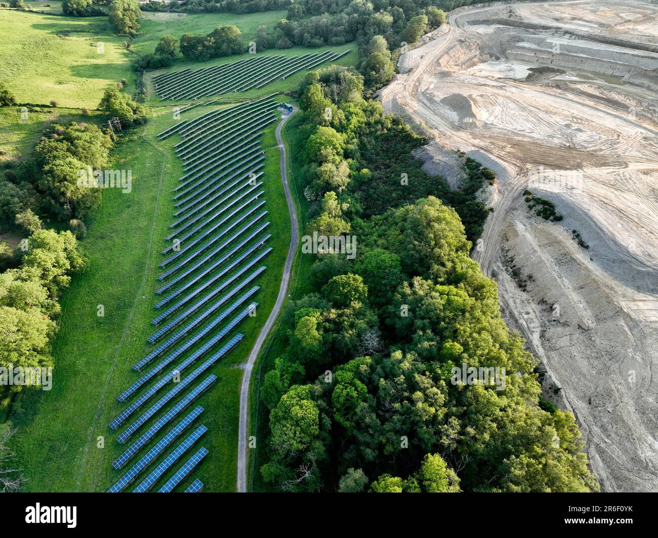 A large-scale solar farm set in a countryside environment Stock Photo ...