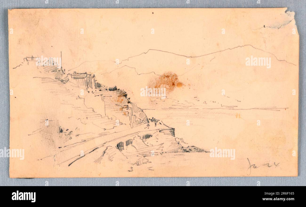 Steep coastal cliff, at left, with town and road below. Water at right ...