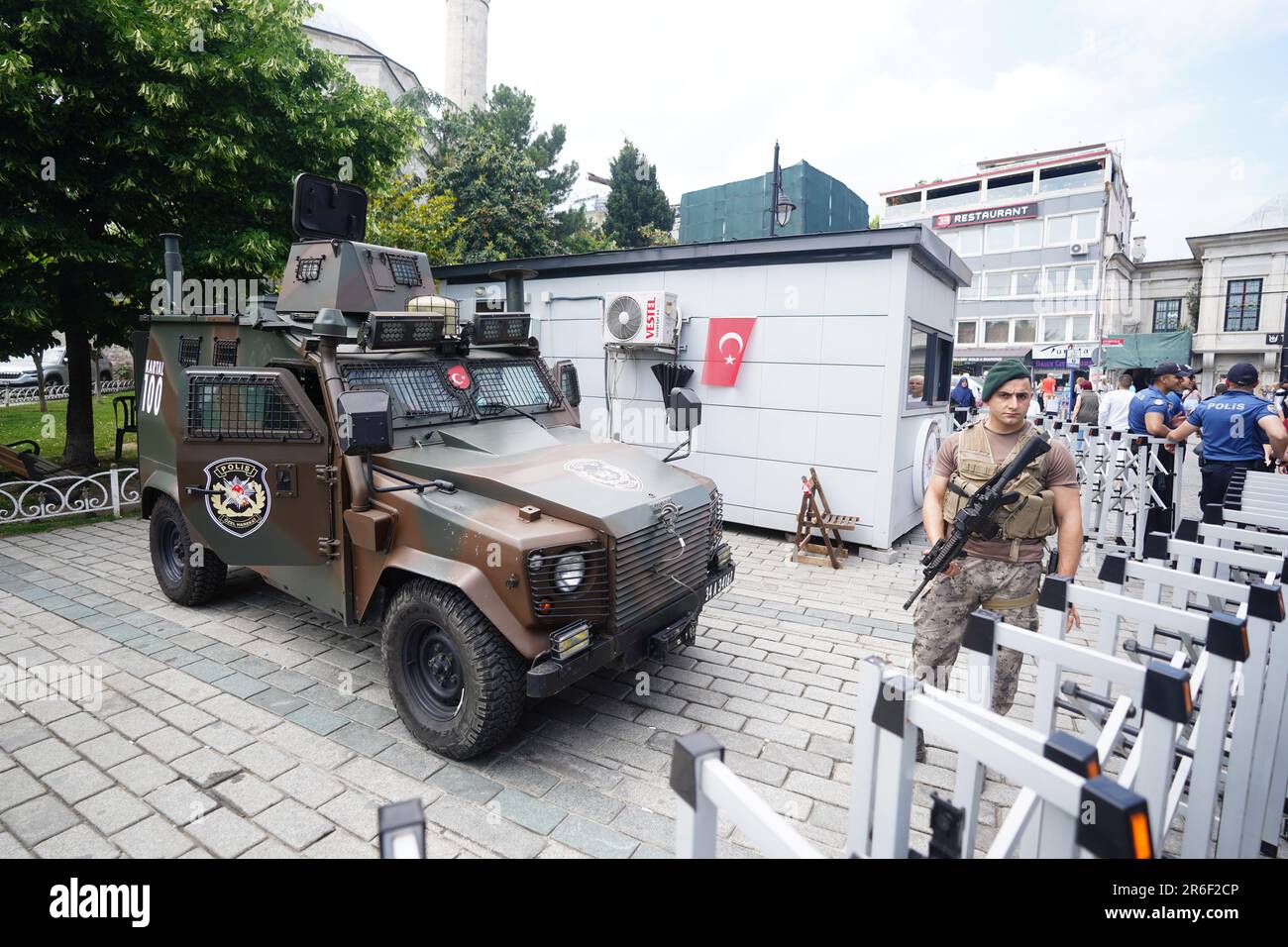 Turkish police stand guard near the Blue Mosque in Istanbul, as Man ...