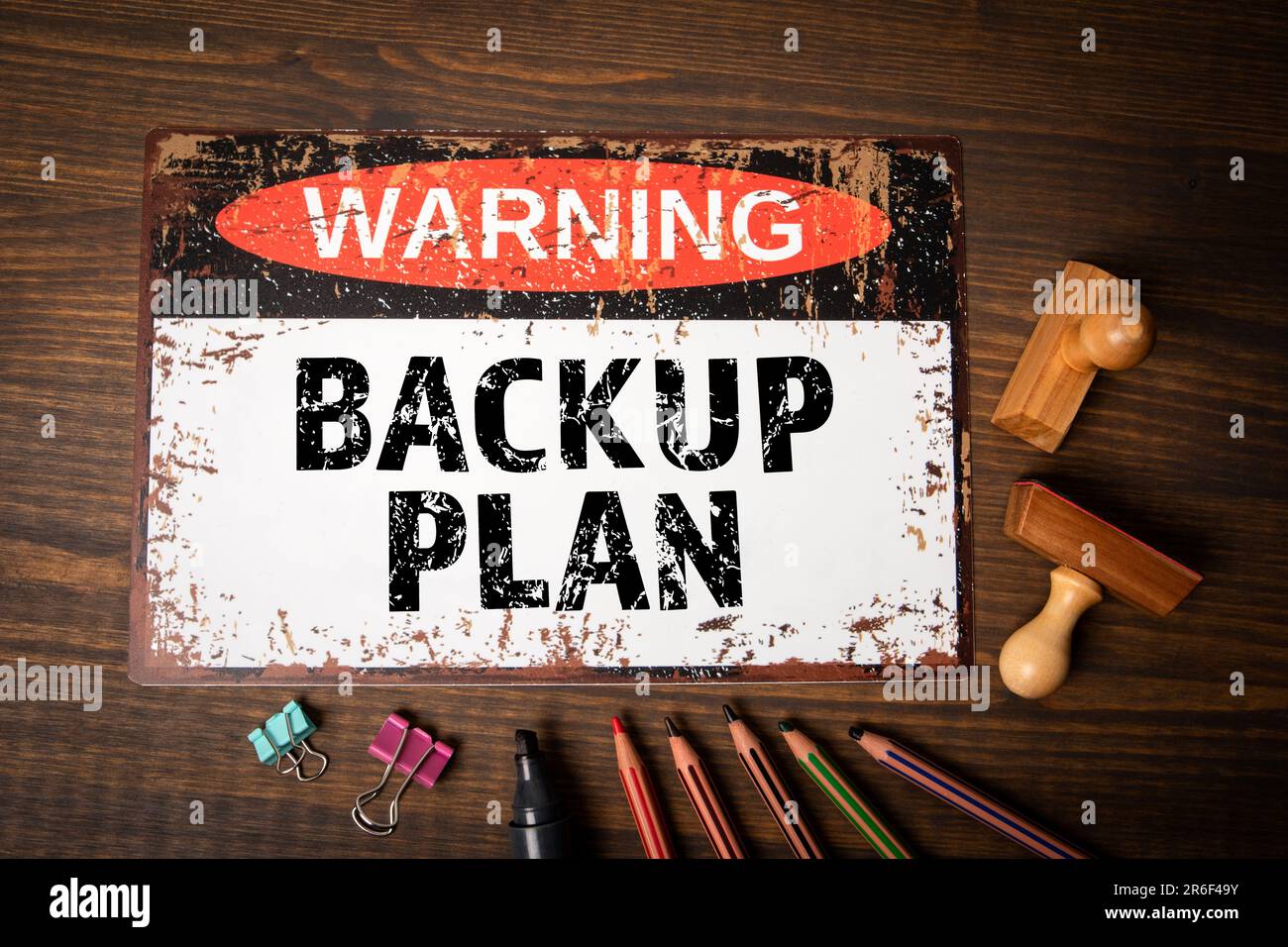 Backup Plan. Warning sign with text on wooden office desk Stock Photo ...