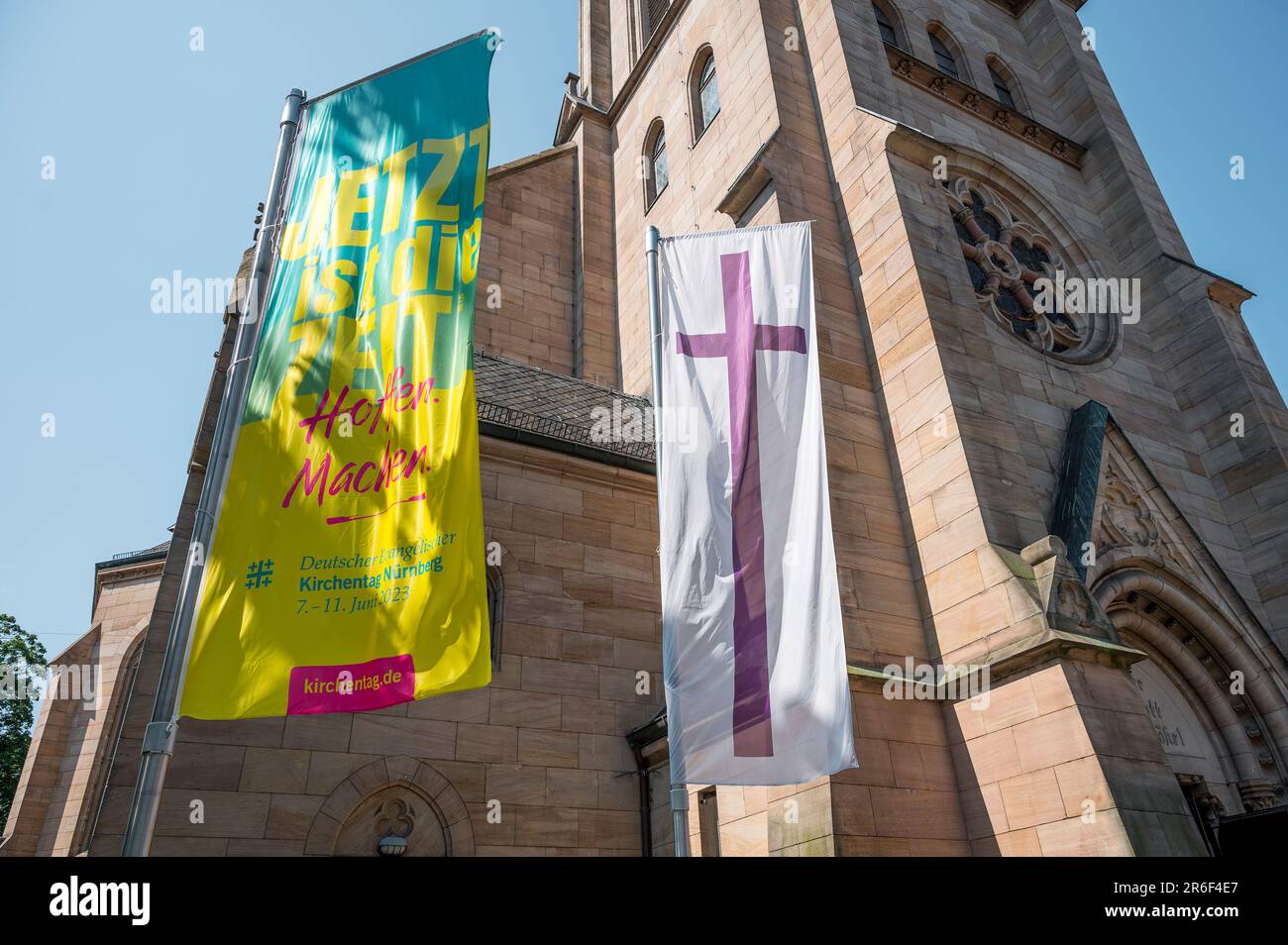 09 June 2023, Bavaria, Fürth: A flag of the German Protestant Church ...