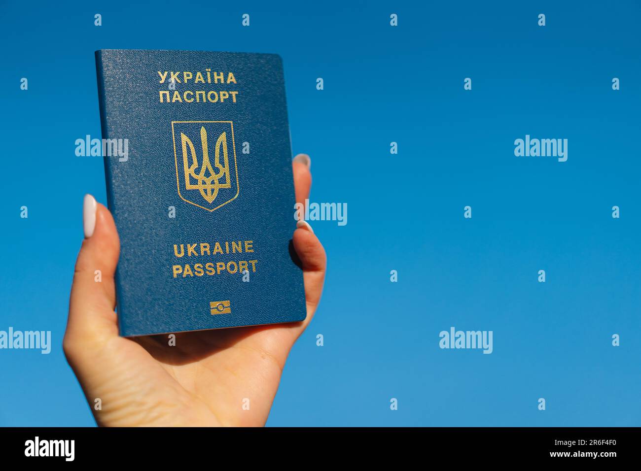 Ukrainian passport in hand ukrainian Stock Photo - Alamy