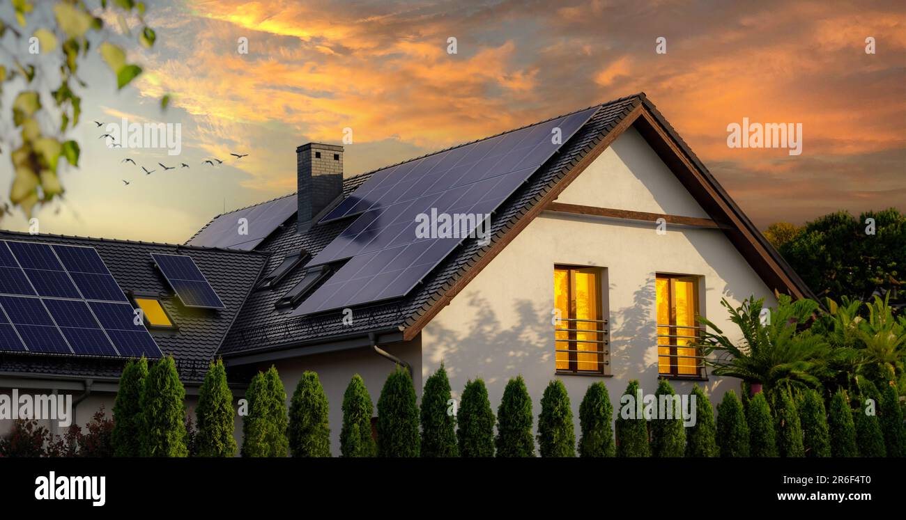 Solar panels on a gable roof. Large modern house and solar energy ...