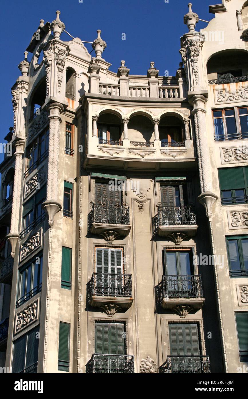 A grand, tall building with traditional architecture located in a ...
