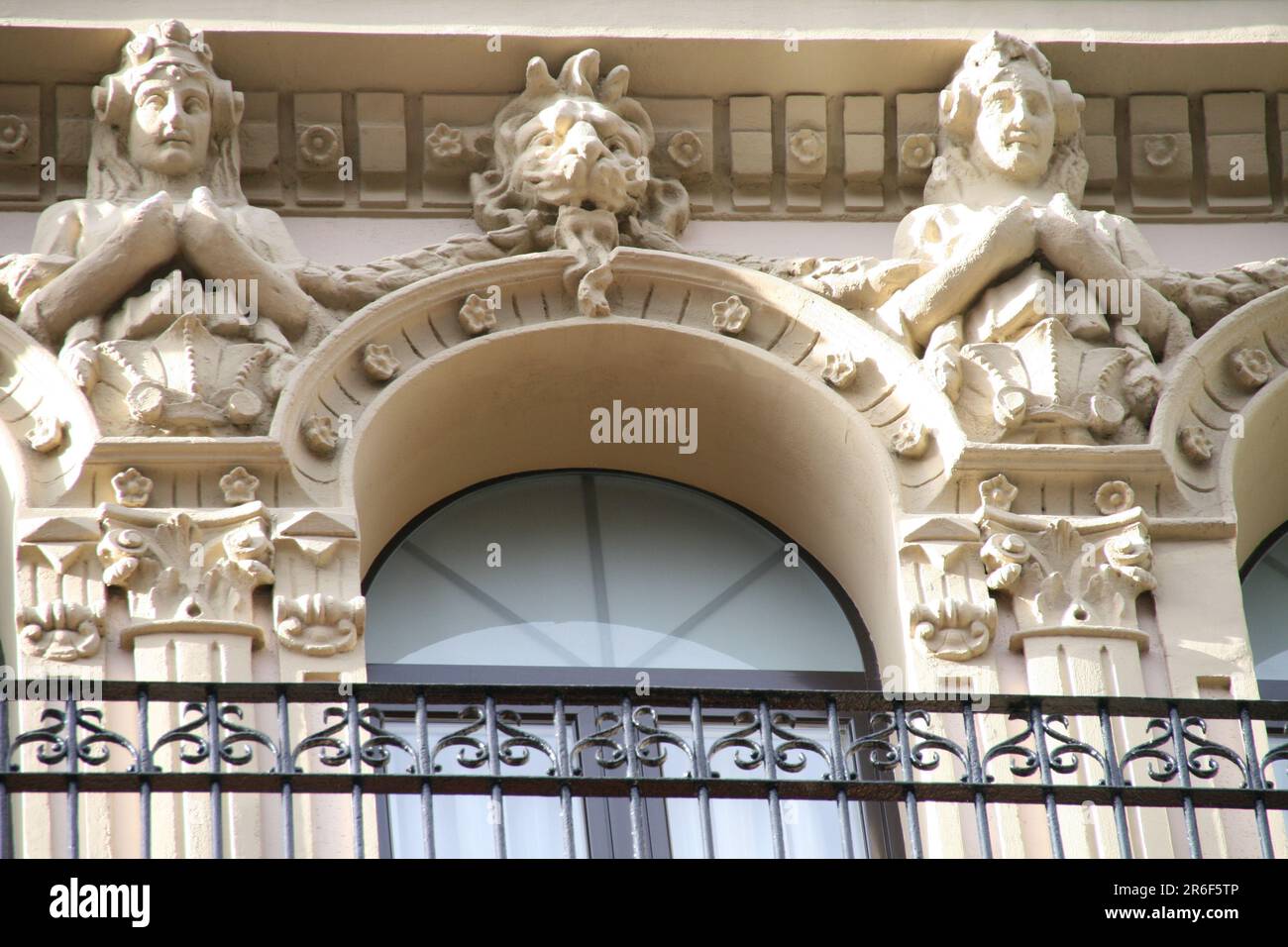 An up-close shot of a building façade featuring an array of ornate ...