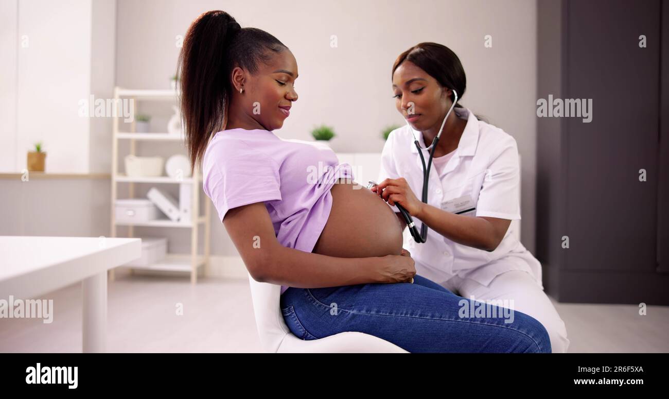 Regular Prenatal Checkup In Maternity Center. Pregnancy And Childbirth ...
