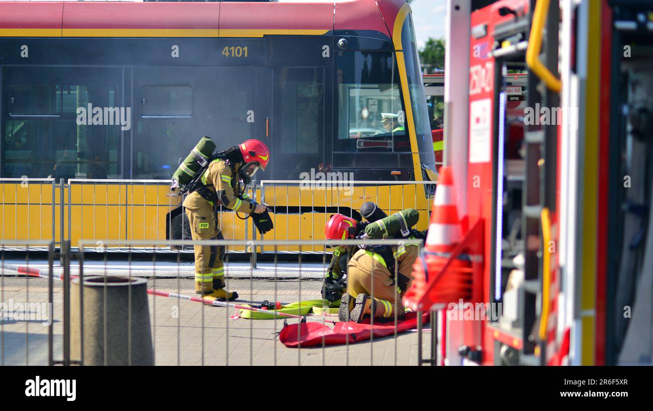 Warsaw, Poland. 4 June 2023. Firemen and burnt tram transport. Fire ...