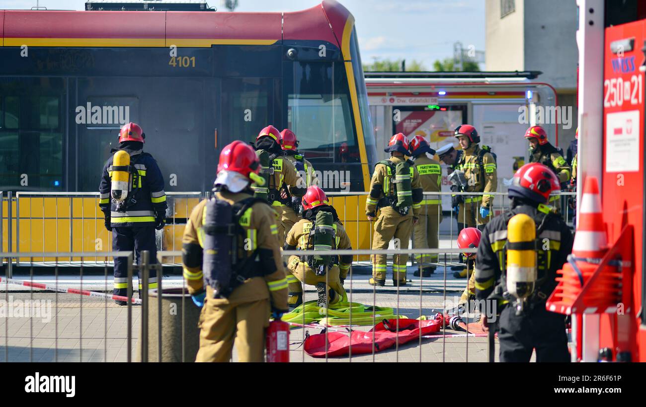 Warsaw, Poland. 4 June 2023. Firemen and burnt tram transport. Fire ...
