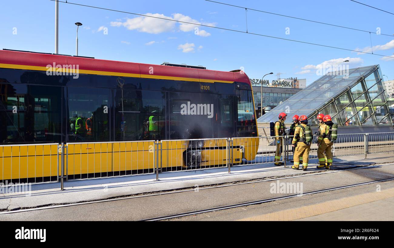 Warsaw, Poland. 4 June 2023. Firemen and burnt tram transport. Fire ...