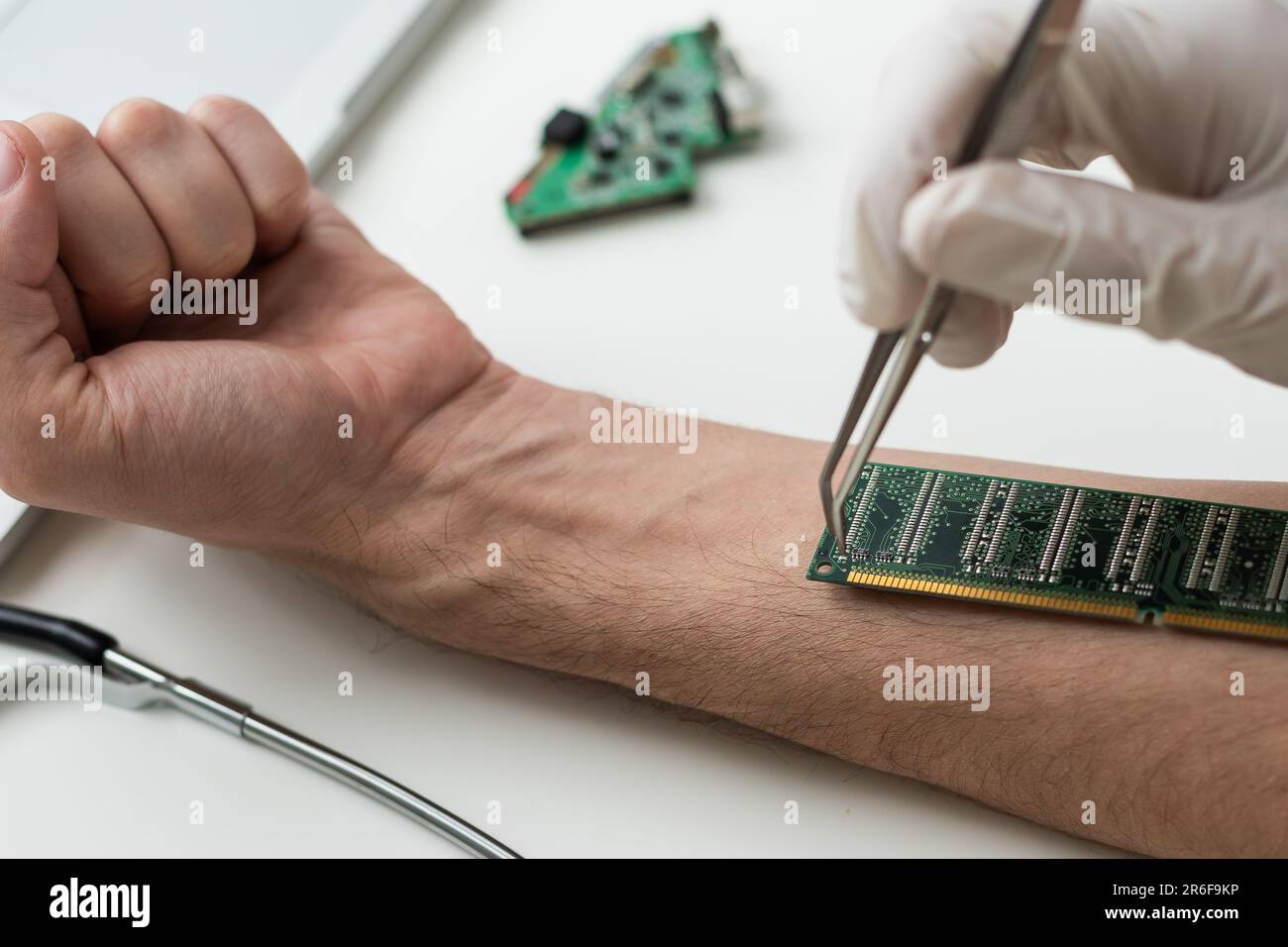 The cosmetic surgeon made a small incision to insert the chip into the ...