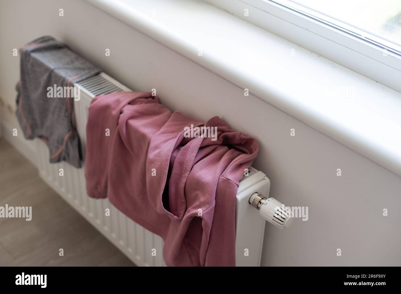 Clothes drying radiator hi-res stock photography and images - Alamy