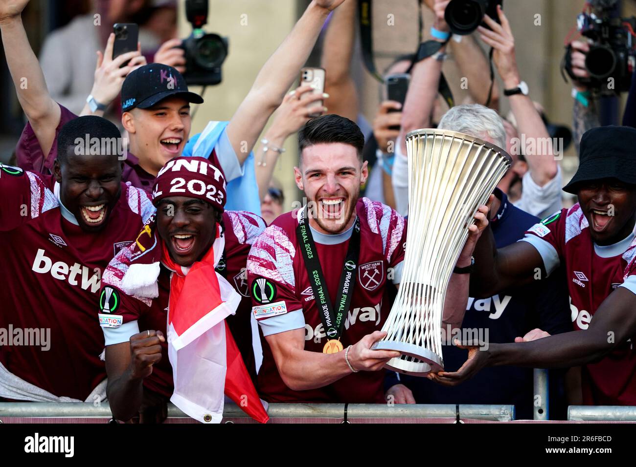 West Ham United's Declan Rice celebrates with the trophy alongside team ...