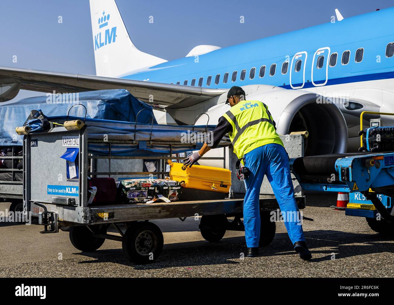 SCHIPHOL - 09/06/2023, KLM baggage handling at Schiphol Airport. ANP ...