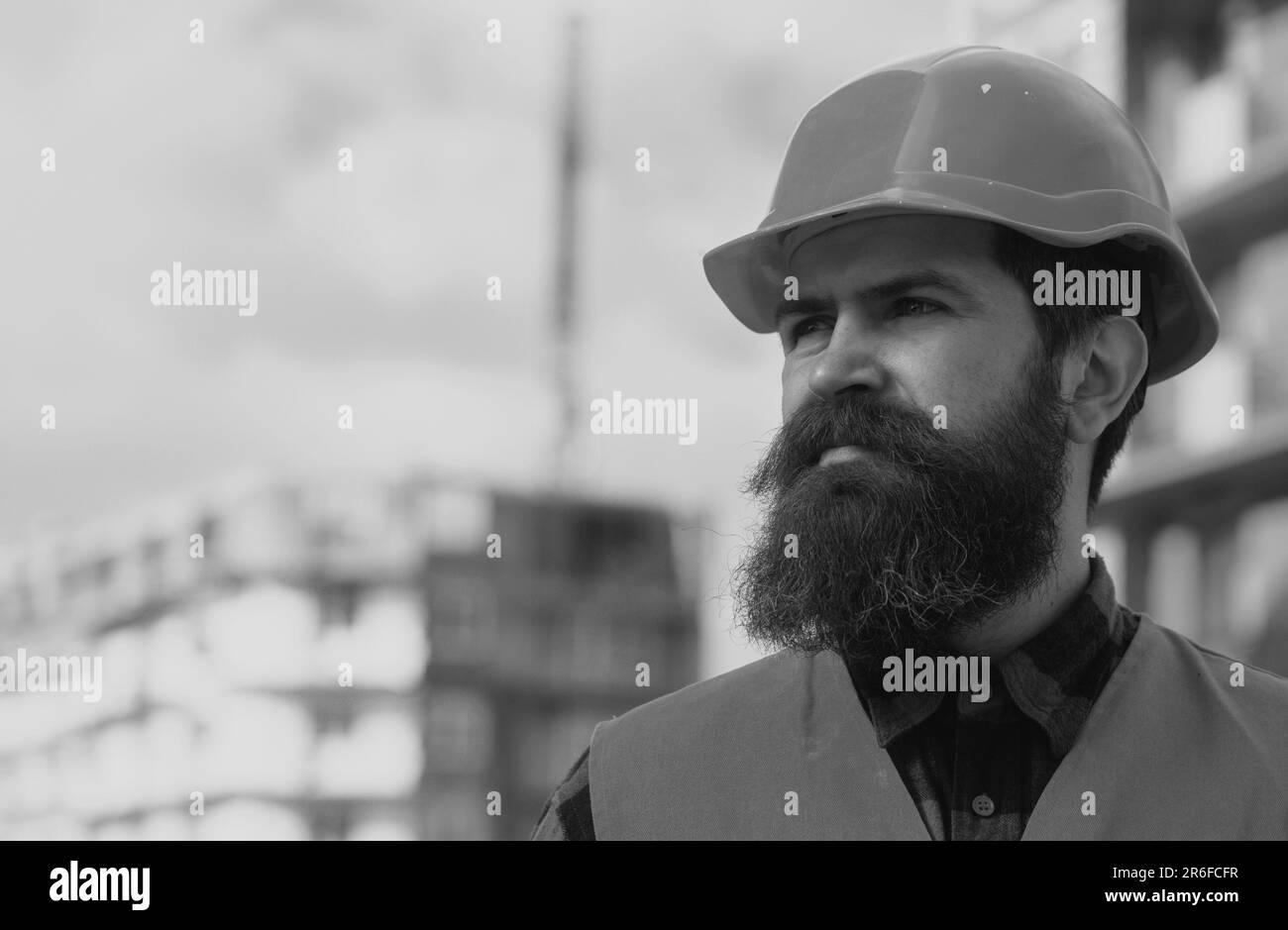 Portrait of construction builder. Man builder worker in helmet posing ...