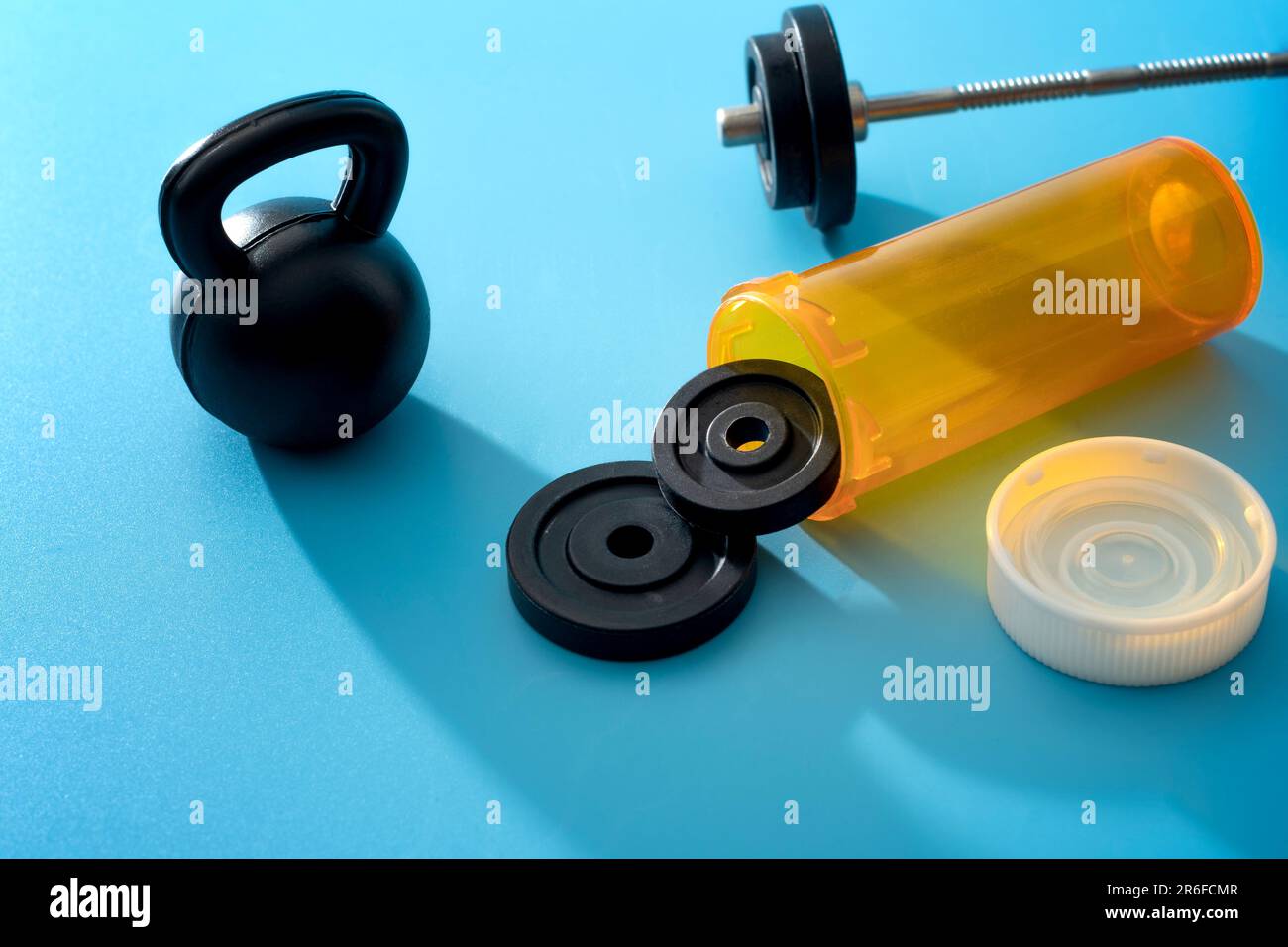 Strength Training Equipment and Prescription Pill Bottle Concept for ...