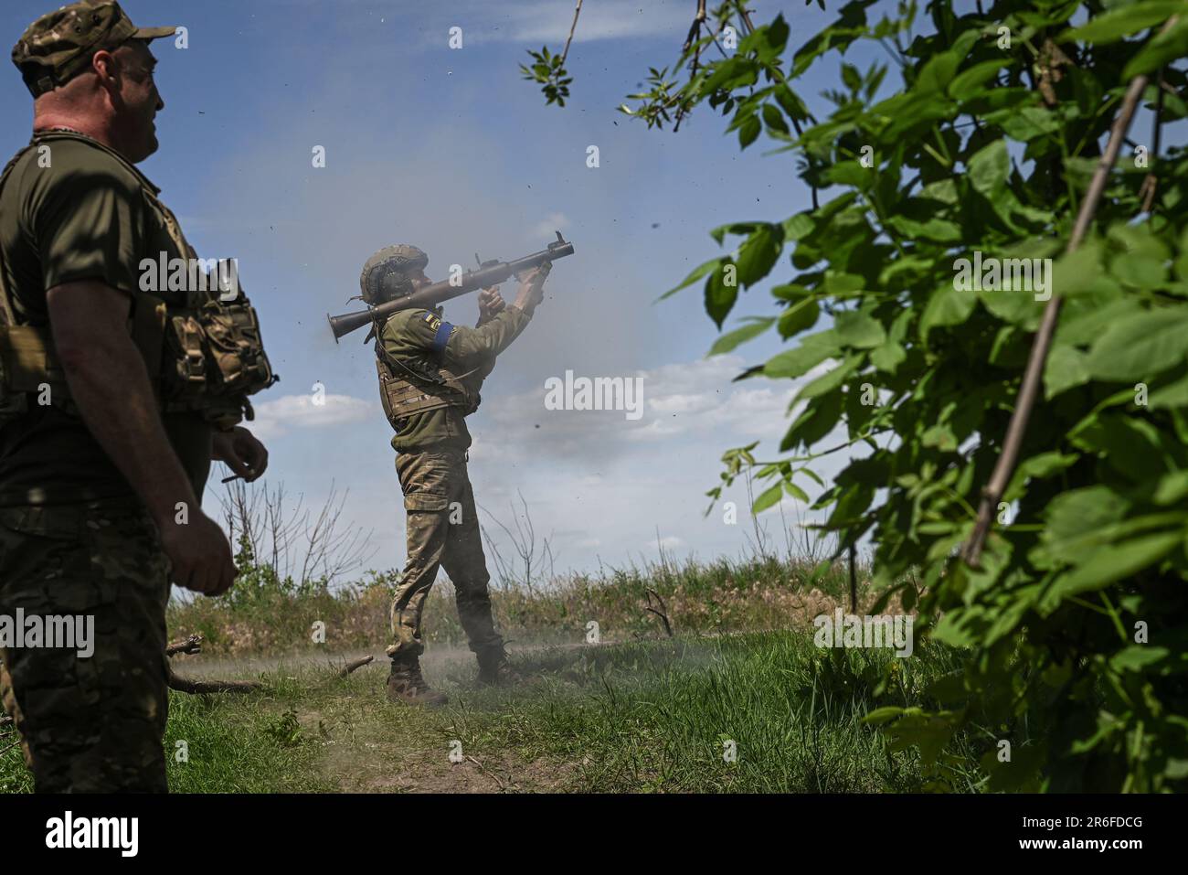 A Ukrainian soldier fires a rocket propelled grenade from an RPG-7 ...