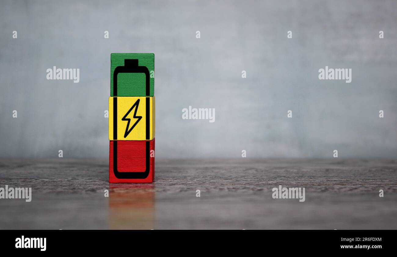 Wooden cubes with battery icon. Copy space for text. Mental health ...