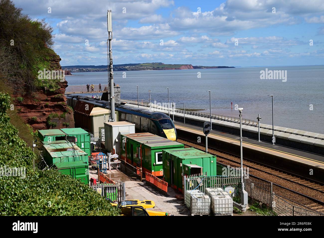 A train passing through Dawlish station during building works to ...
