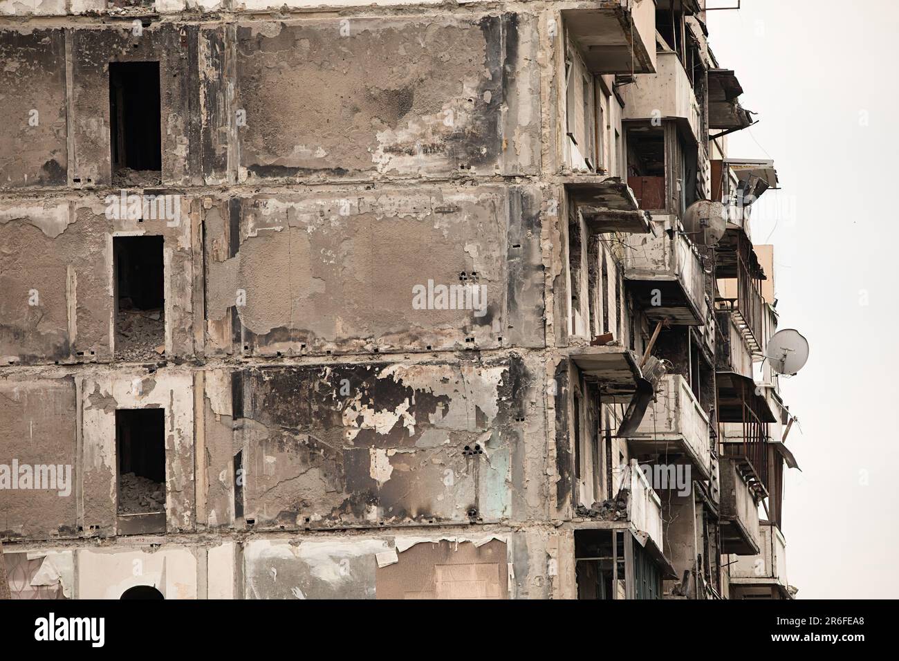 Ravaged Facade: A Glimpse of a High-Rise Building Scarred by Conflict ...