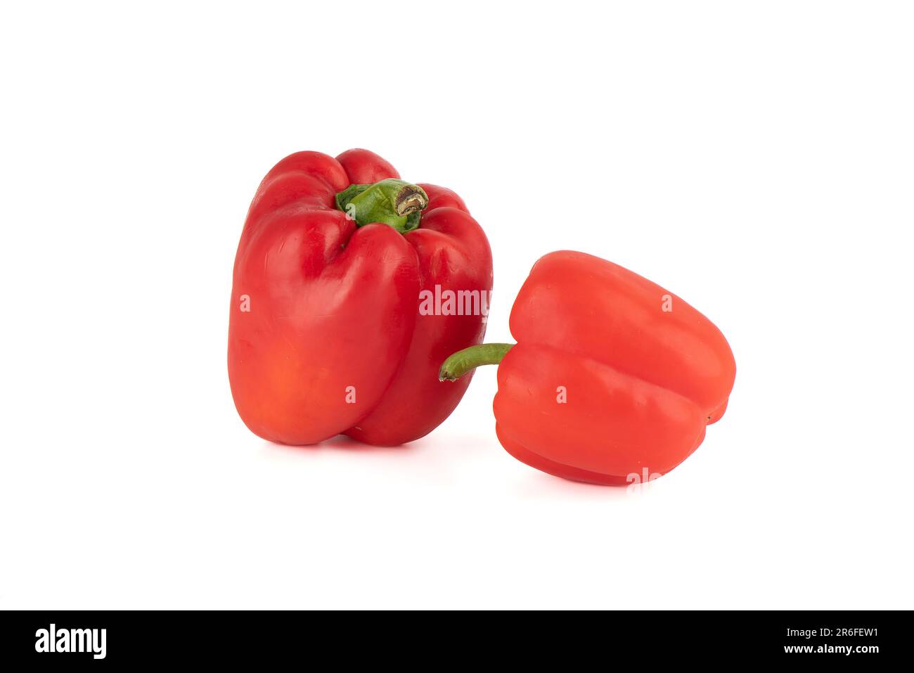 Two red peppers isolated on a white background. Copy space Stock Photo ...