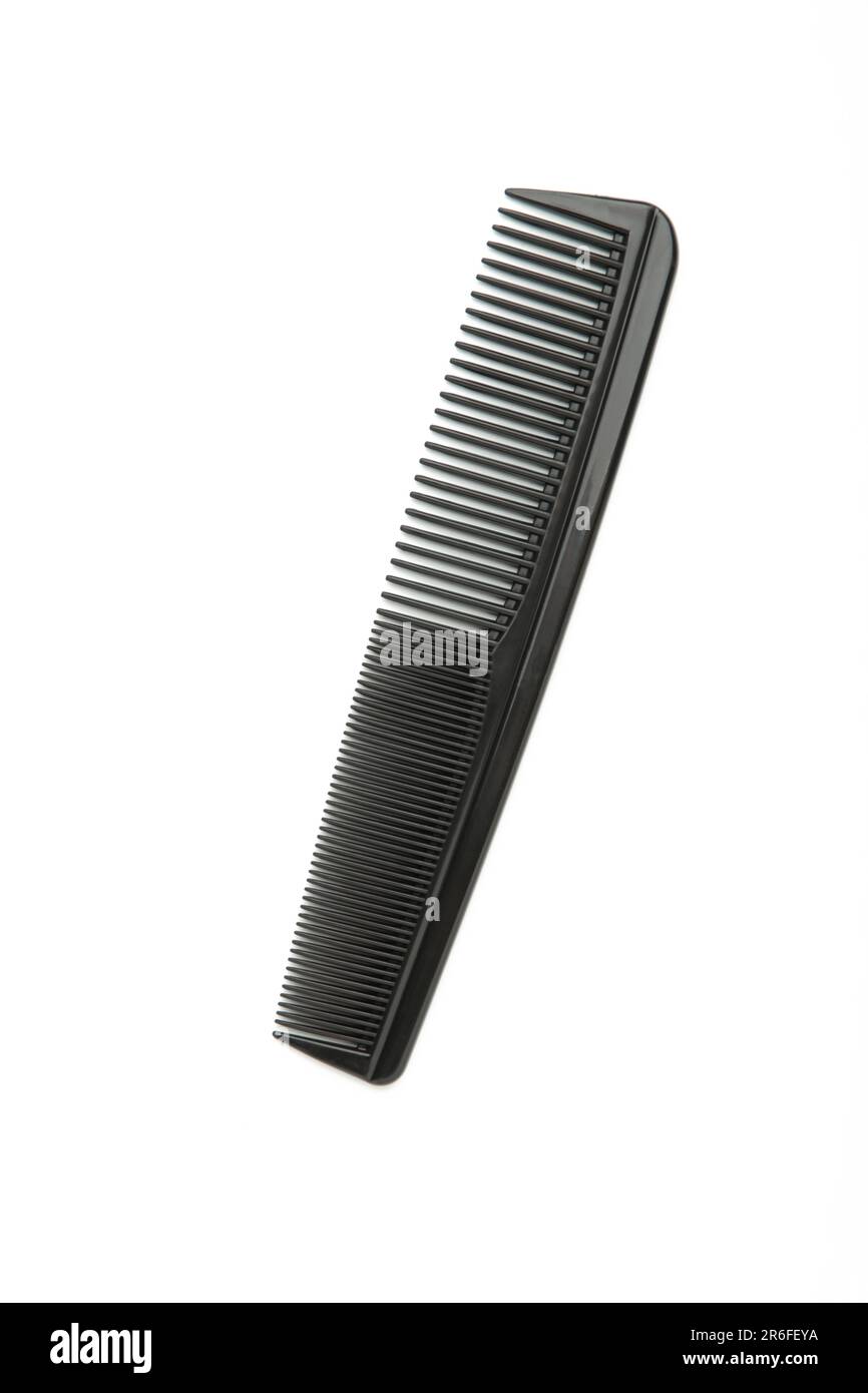 Black comb isolated on white background, close up Stock Photo - Alamy