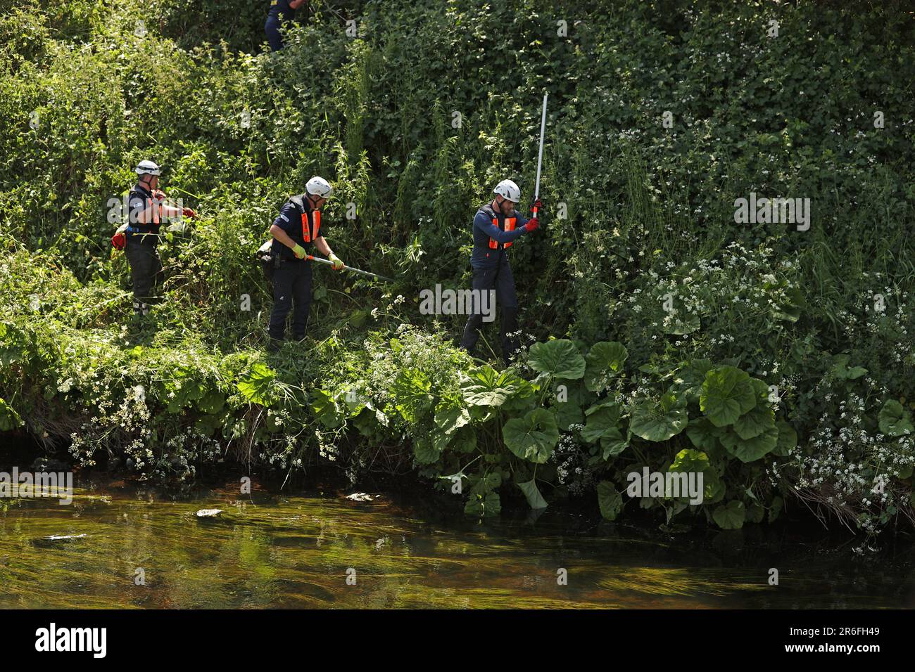 Search and Rescue teams on the bank of the River Braid in Ballymena as ...