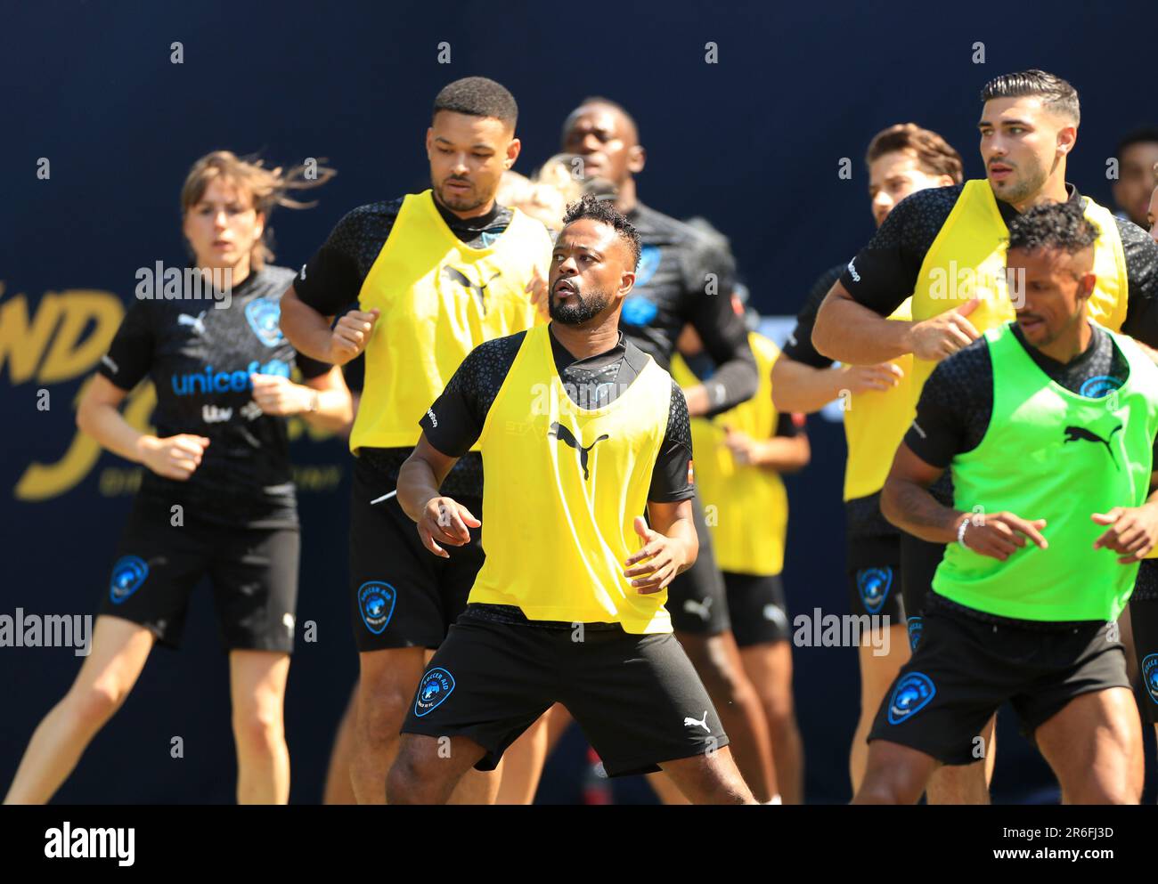 Patrice Evra (centre) during a training session at Champneys Tring ...