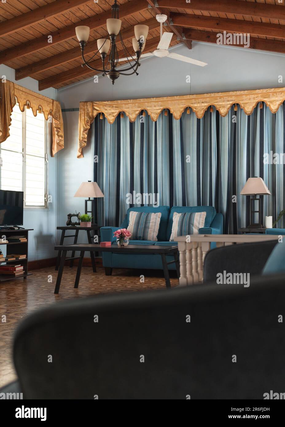 This image features a warm and welcoming interior living room of an old ...