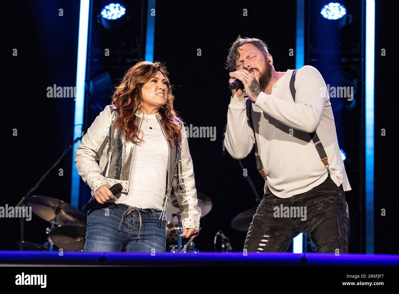 Jo Dee Messina, left, and Ben Fuller perform during the 2023 CMA Fest ...