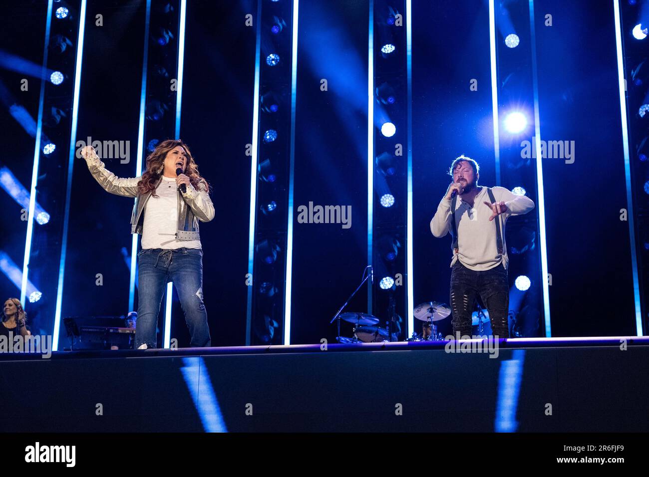 Jo Dee Messina, left, and Ben Fuller perform during the 2023 CMA Fest ...
