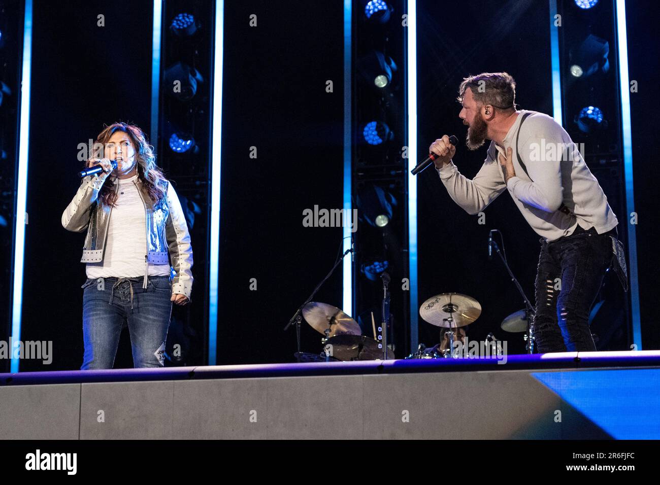 Jo Dee Messina, left, and Ben Fuller perform during the 2023 CMA Fest ...