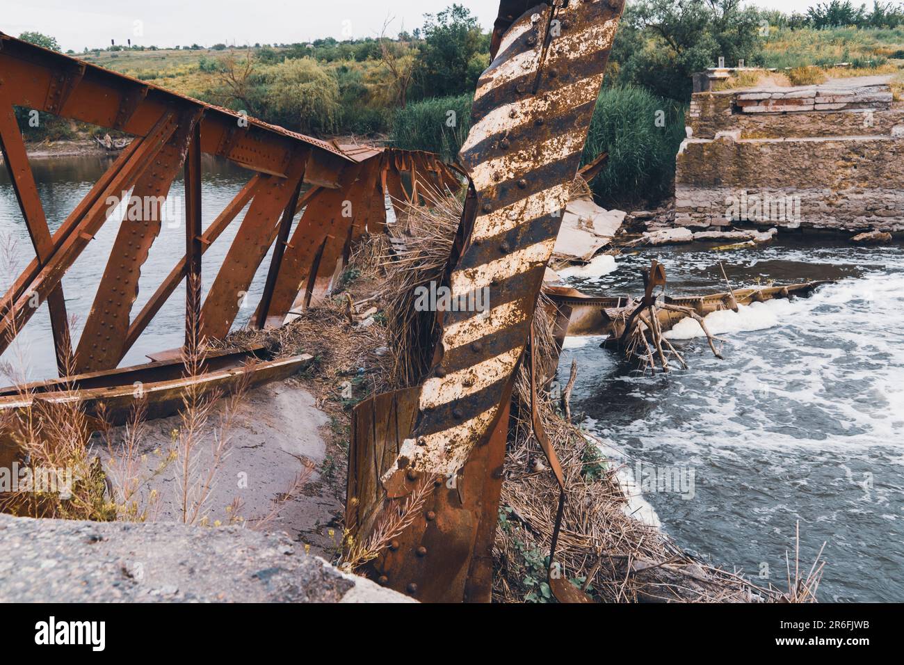 Bridge on the river, destroyed by the water flow. Catastrophe, natural ...