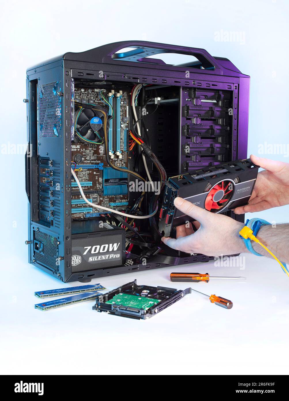 Home repairs of a computer tower Stock Photo - Alamy