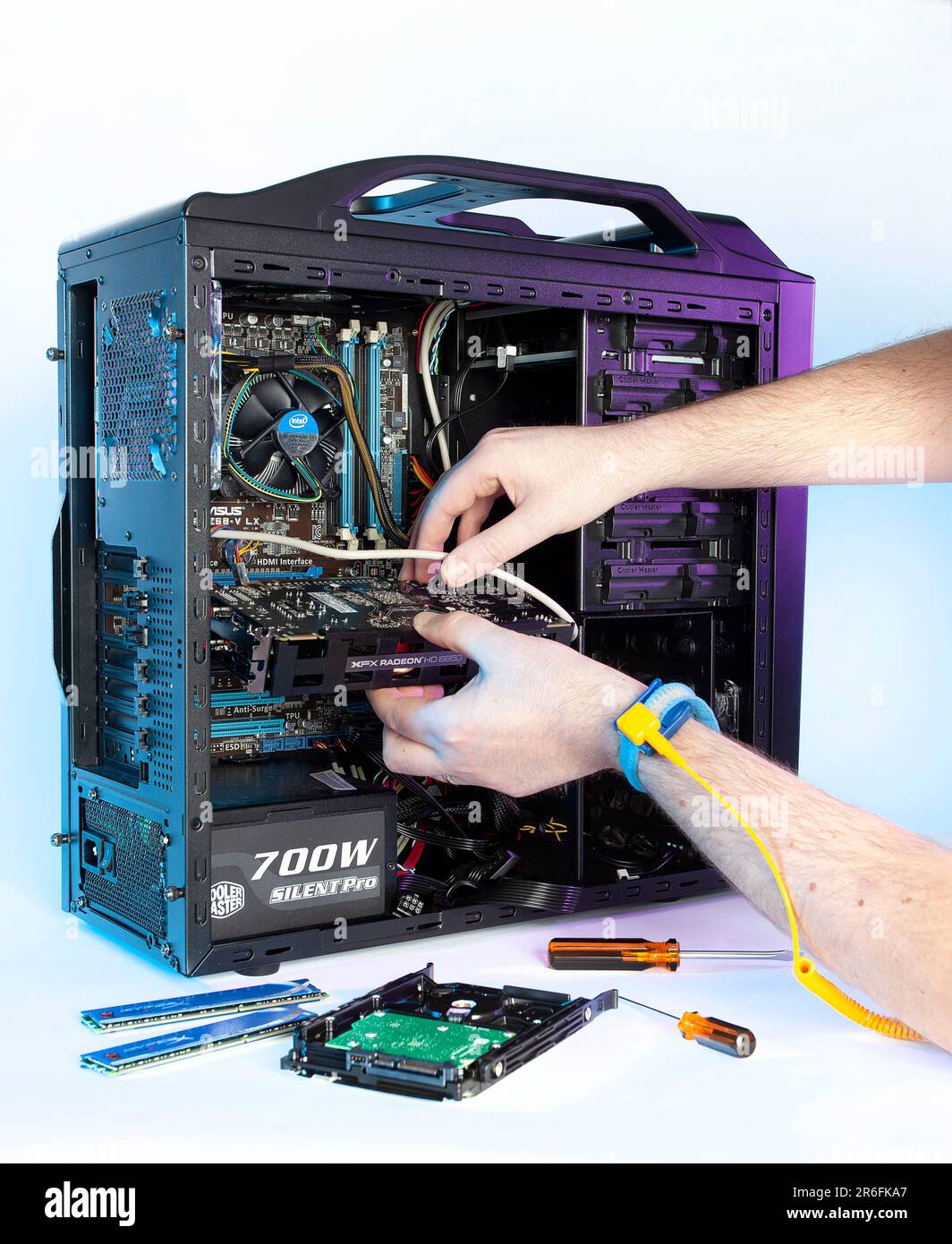 Home repairs of a computer tower Stock Photo - Alamy