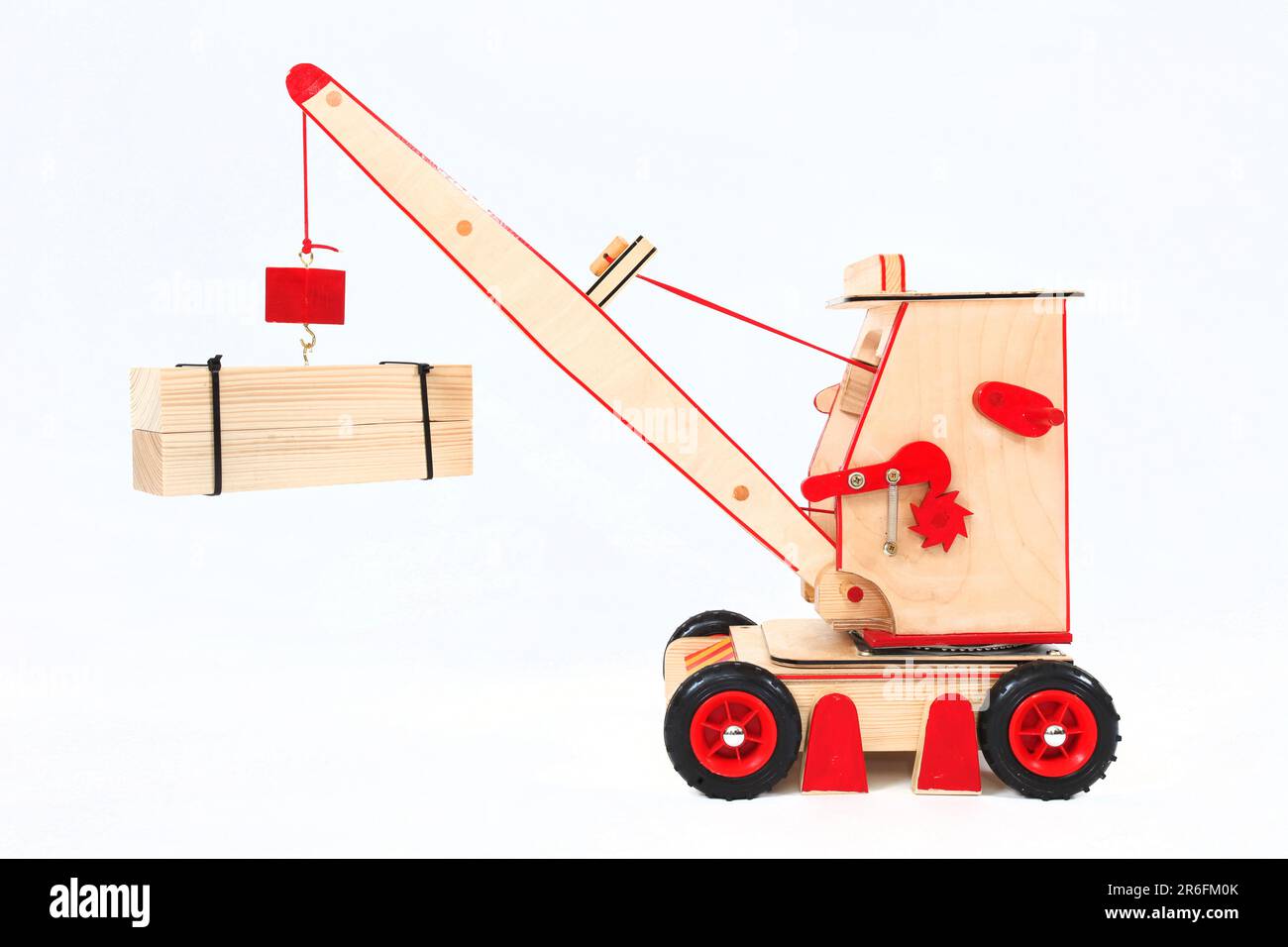 A child's wooden digger toy Stock Photo - Alamy