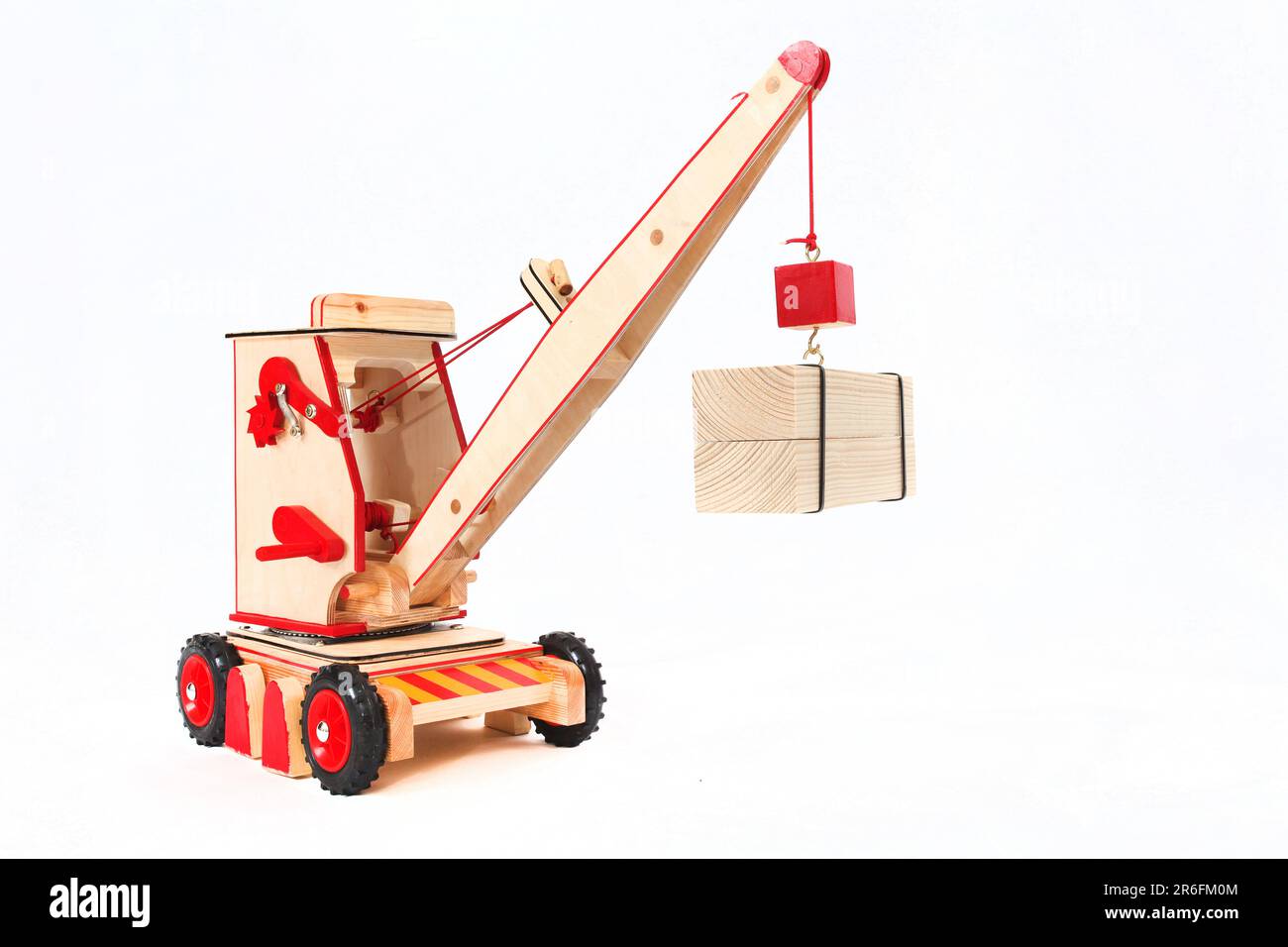 A child's wooden digger toy Stock Photo - Alamy