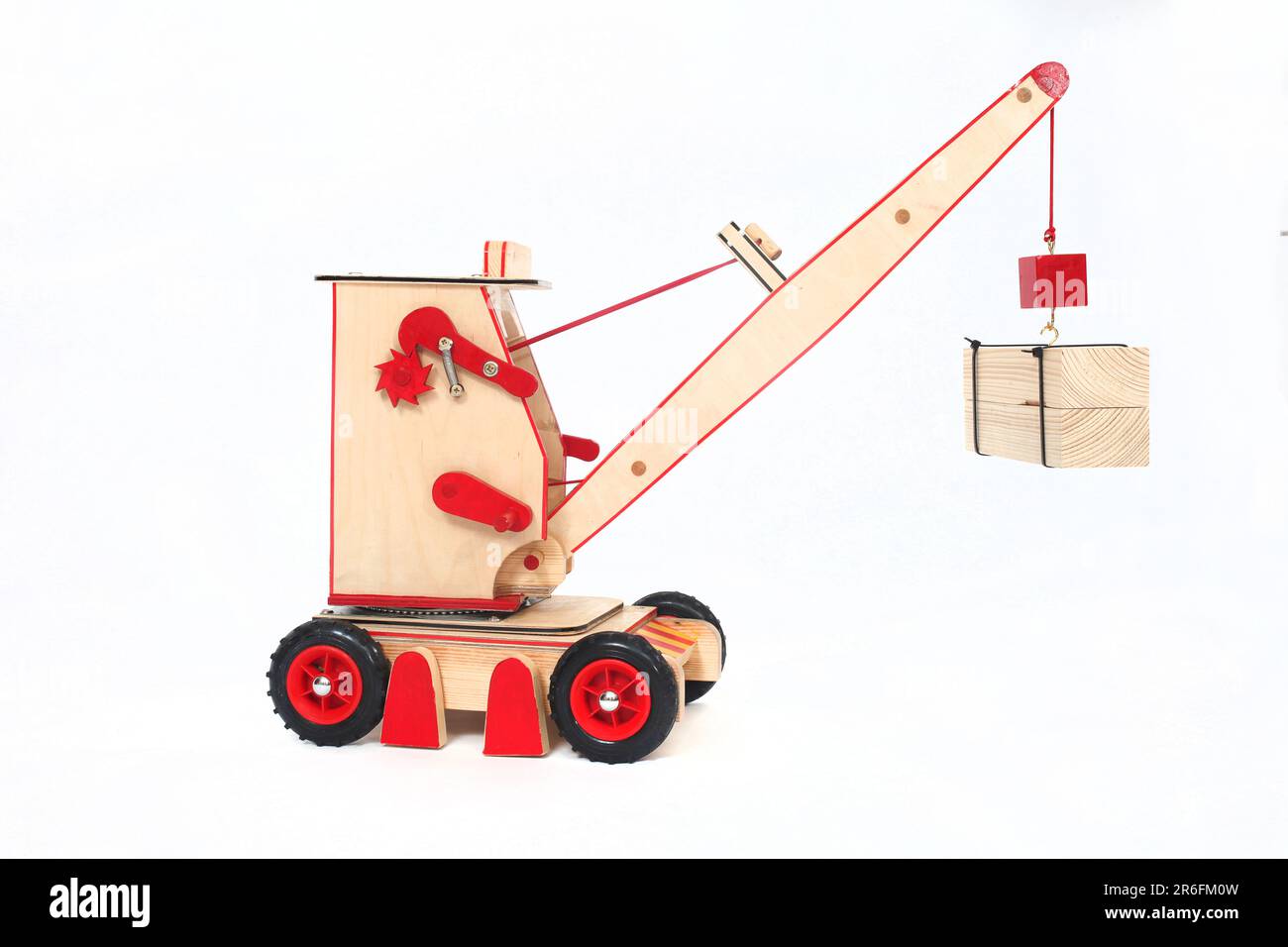 A wooden digger toy Stock Photo - Alamy