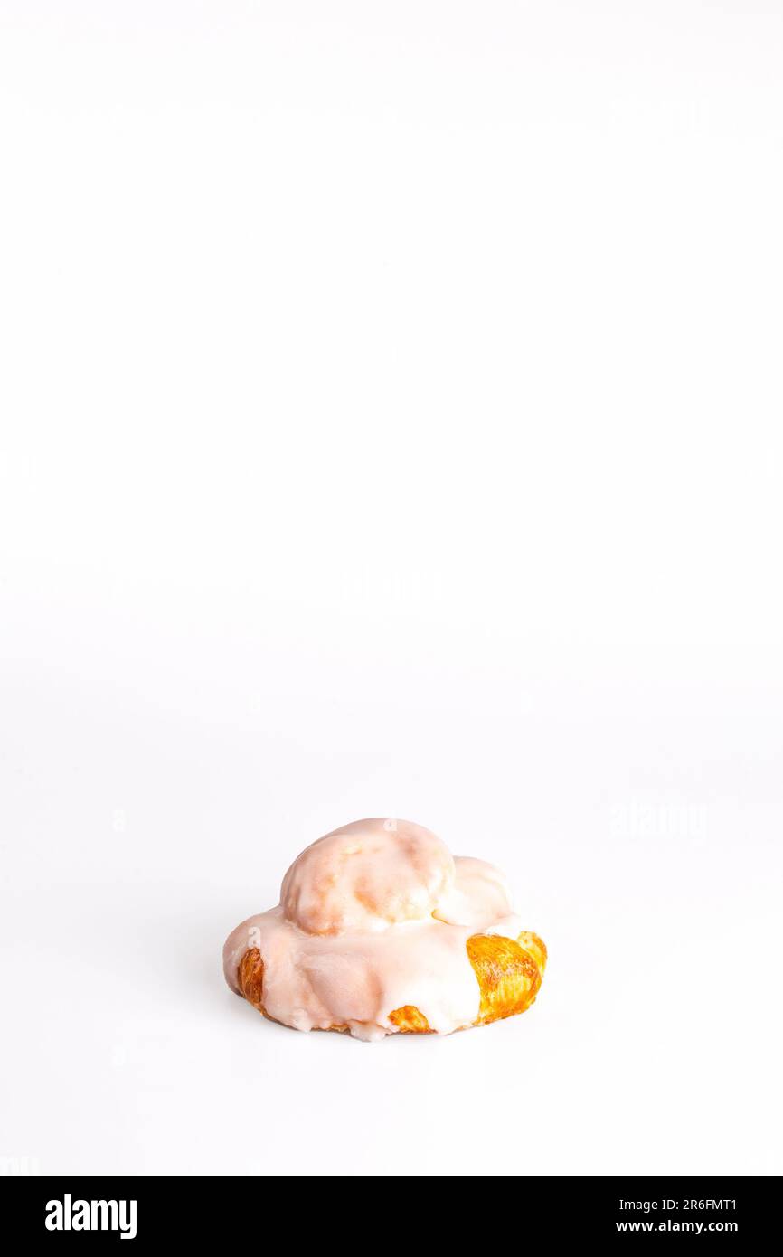 fresh bun with delicate cream on a white background Stock Photo - Alamy