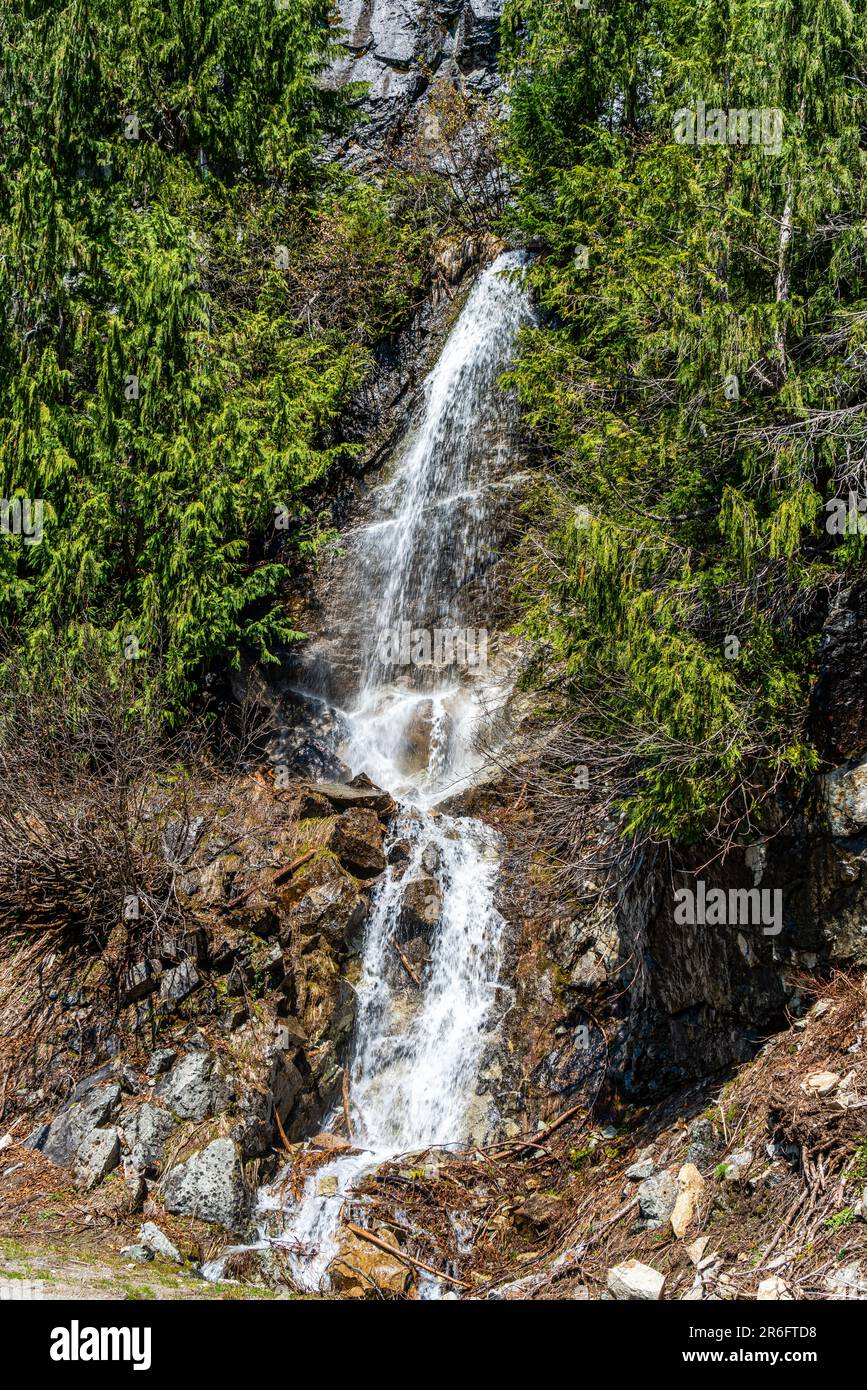 A view of a waterfall on the side of Highway 410 in Washington State ...