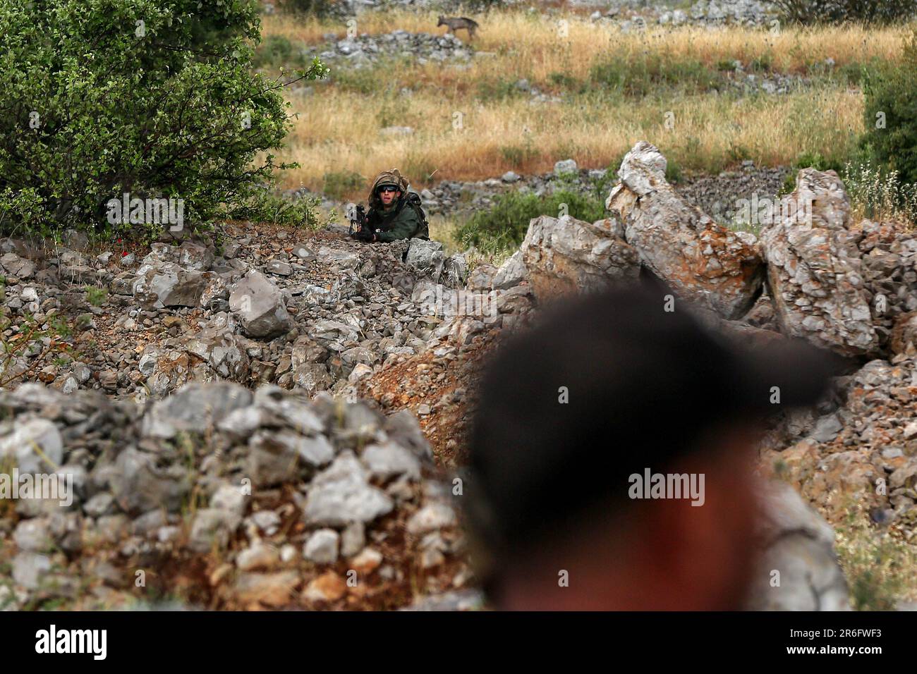 Kfarchouba, Lebanon. 09th June, 2023. An Israeli soldier takes position ...
